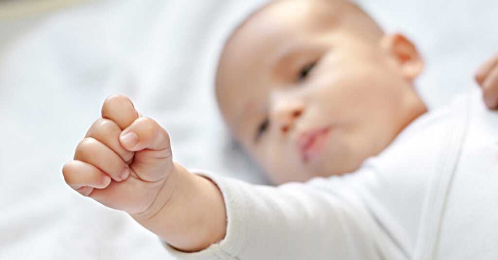 7 things it means when your baby has closed fists